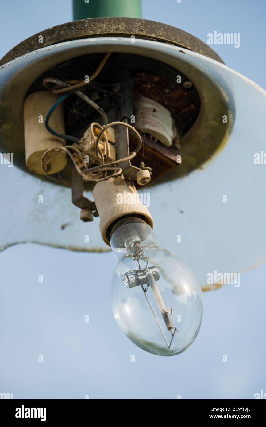 Broken glass diffuser of a street lamp post Stock Photo - Alamy
