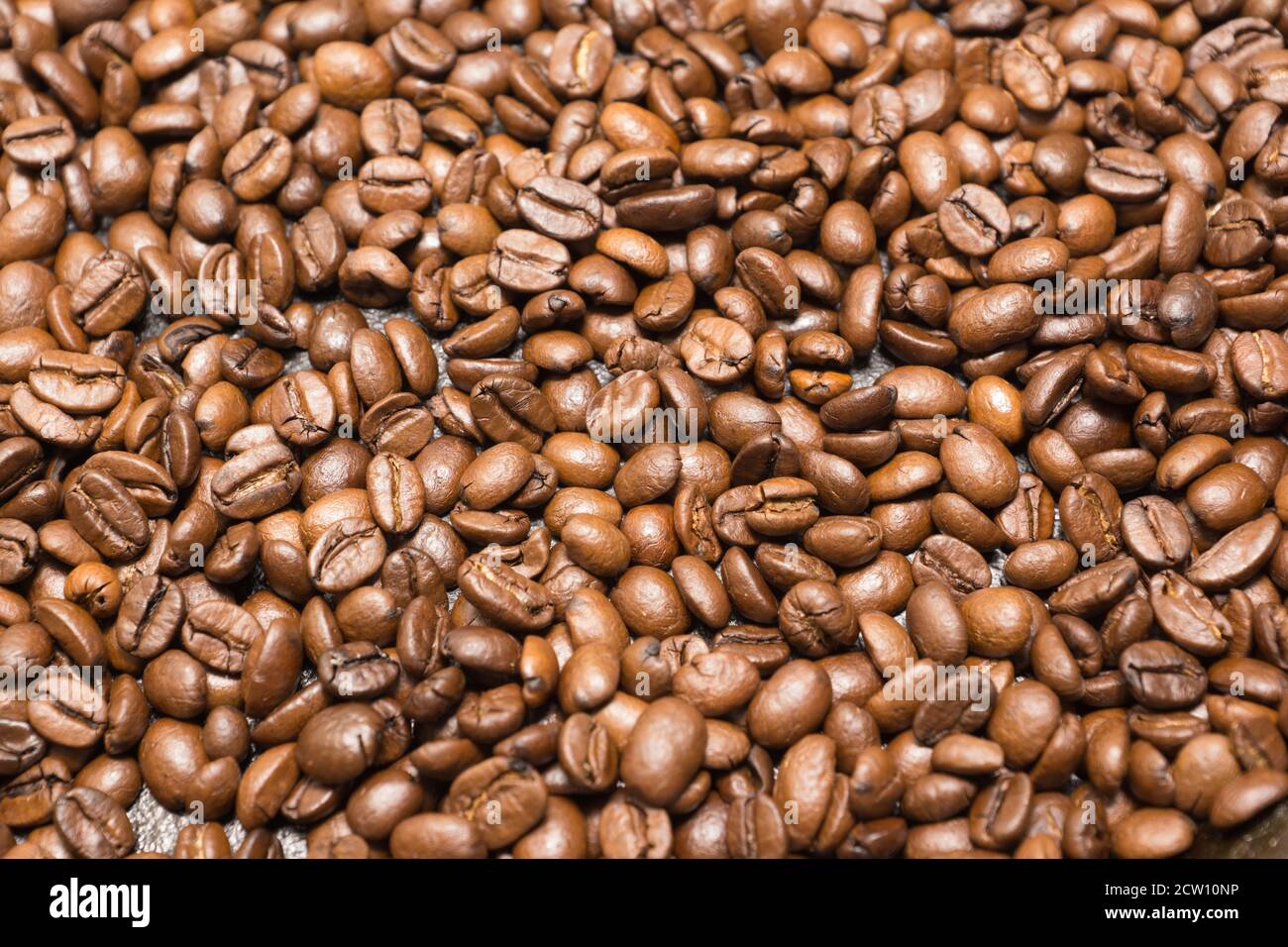 Freshly roasted coffee beans pouring hi-res stock photography and ...