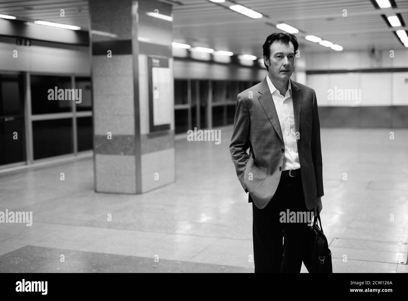 Mature handsome businessman exploring hi-res stock photography and ...