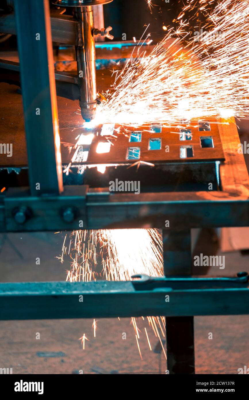 Plasma cutting of steel on a rack Stock Photo - Alamy