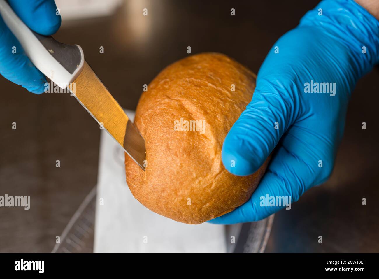 Artisan preparation of classic Italian maritozzo, sweet bun, with ice ...