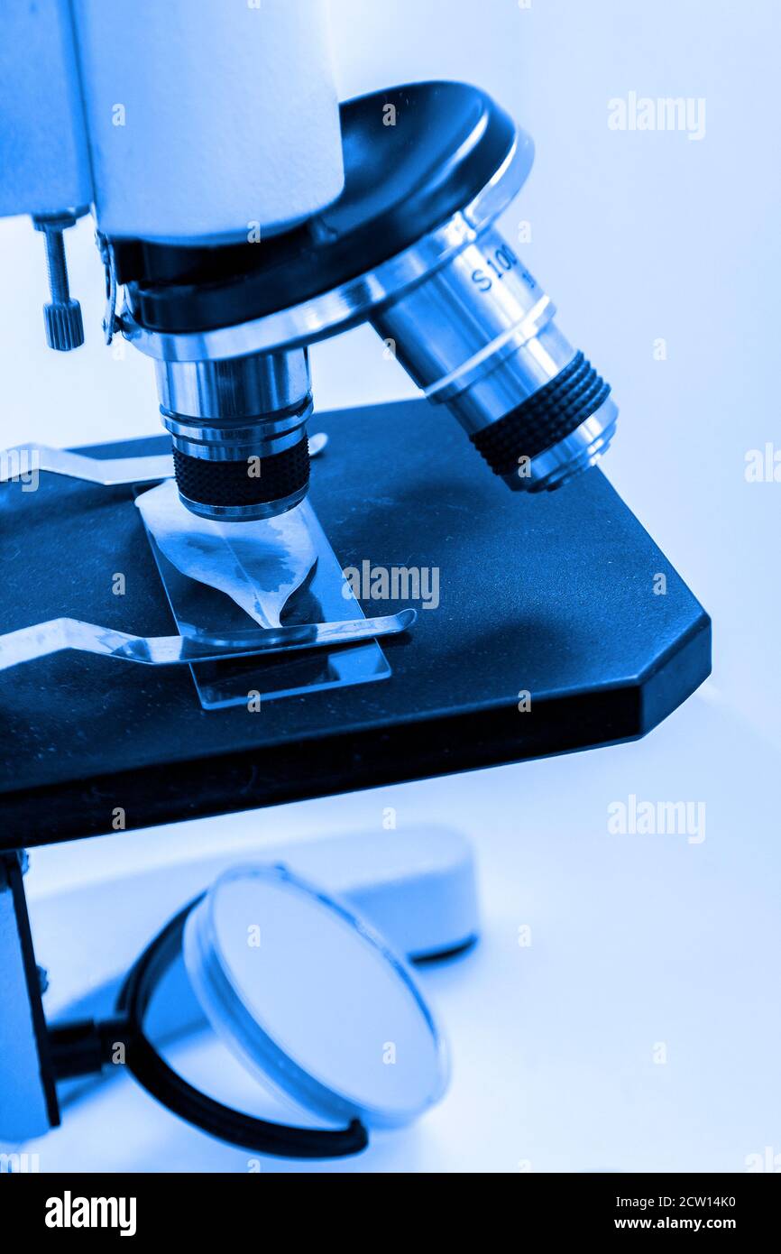 Closeup lens of a modern scientific microscope in the laboratory ...