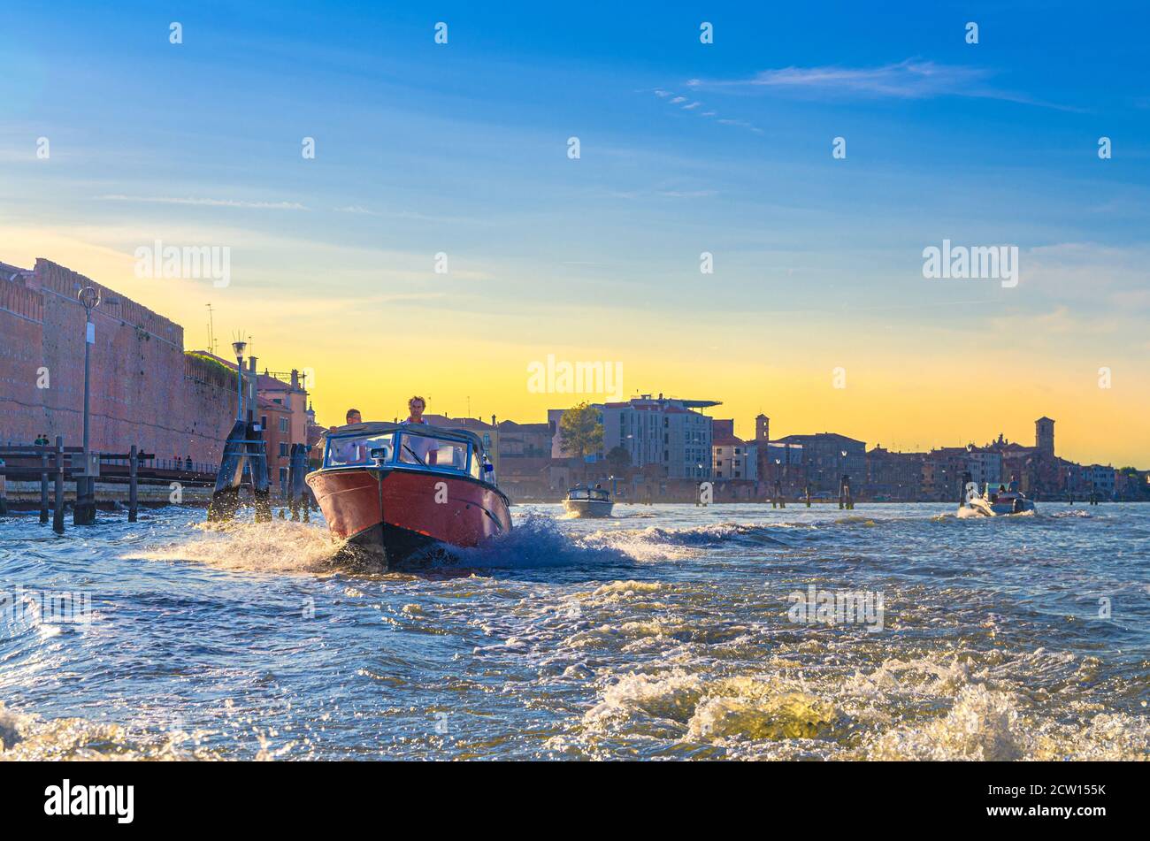 Venice, Italy, September 14, 2019: Yachtman driving yacht boat racing ...