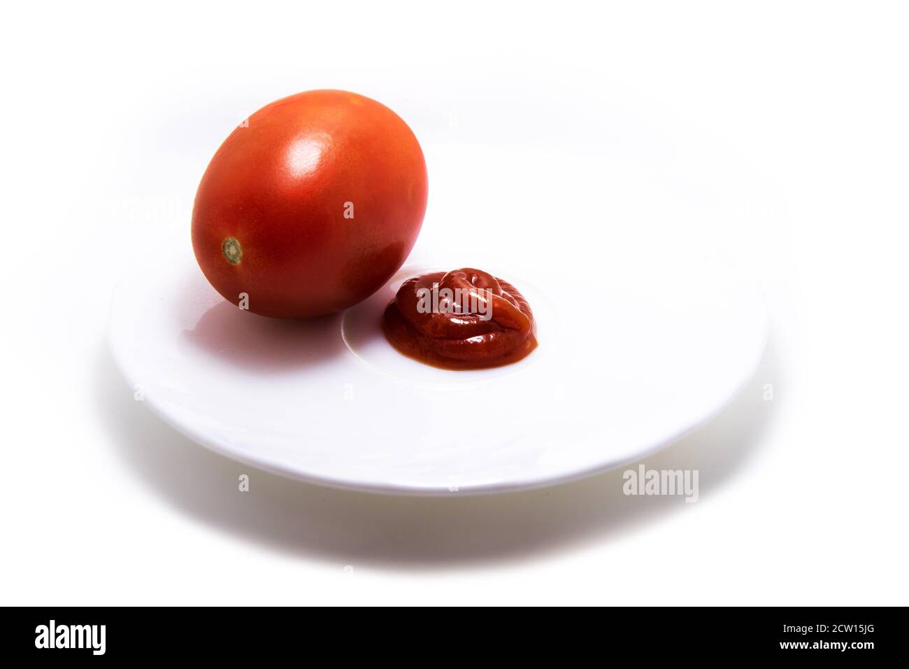 Ketchup serving on white background Stock Photo - Alamy