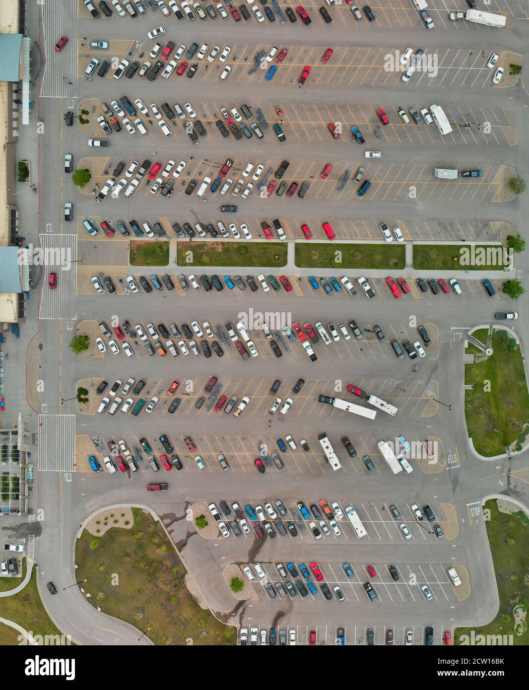 Aerial view of cars at large outdoor parking lots; USA. Outlet mall ...
