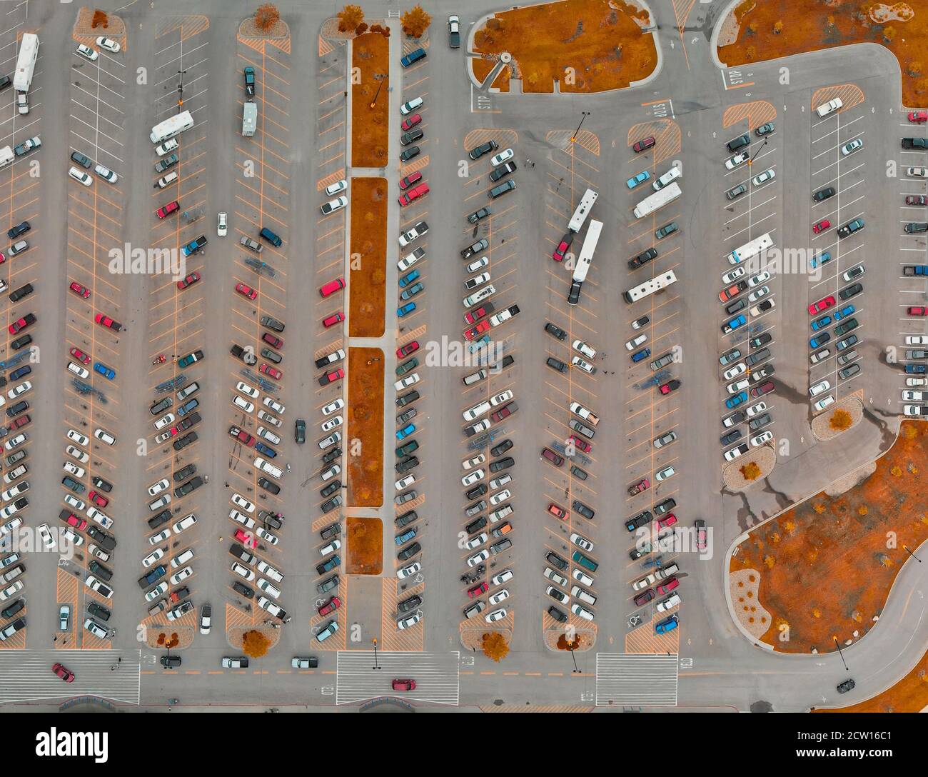 Aerial view of cars at large outdoor parking lots; USA. Outlet mall ...