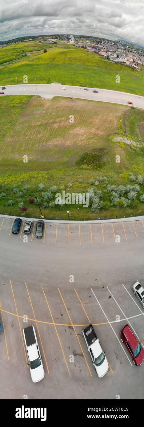 Aerial view of cars at large outdoor parking lots; USA. Outlet mall ...