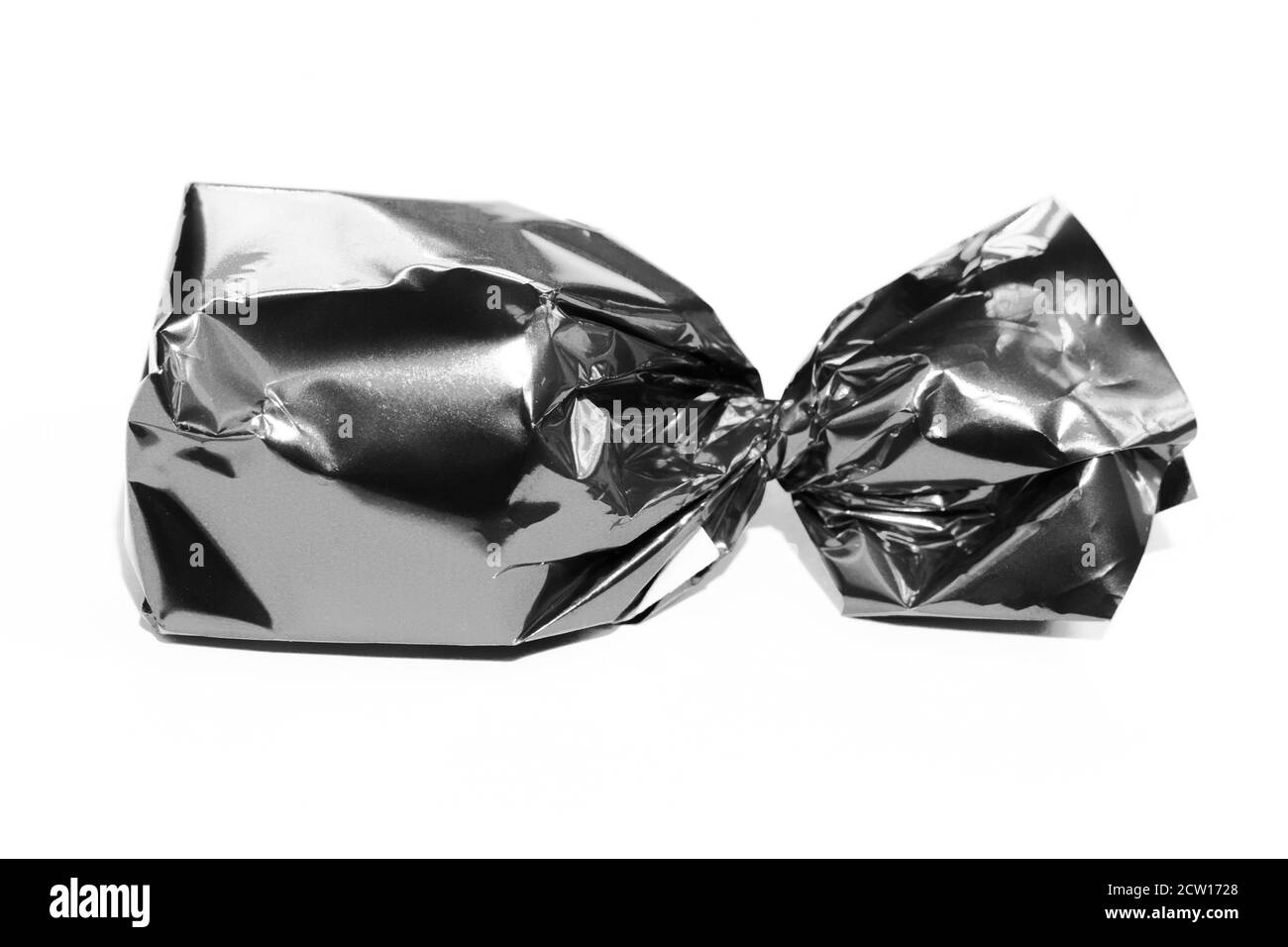 Silver candy wrapped isolated on white Stock Photo - Alamy