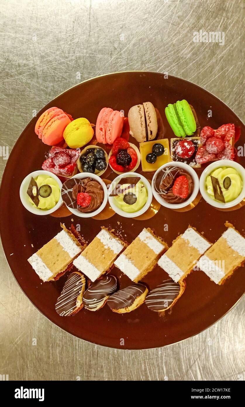 assorted french pastries in a plate Stock Photo - Alamy