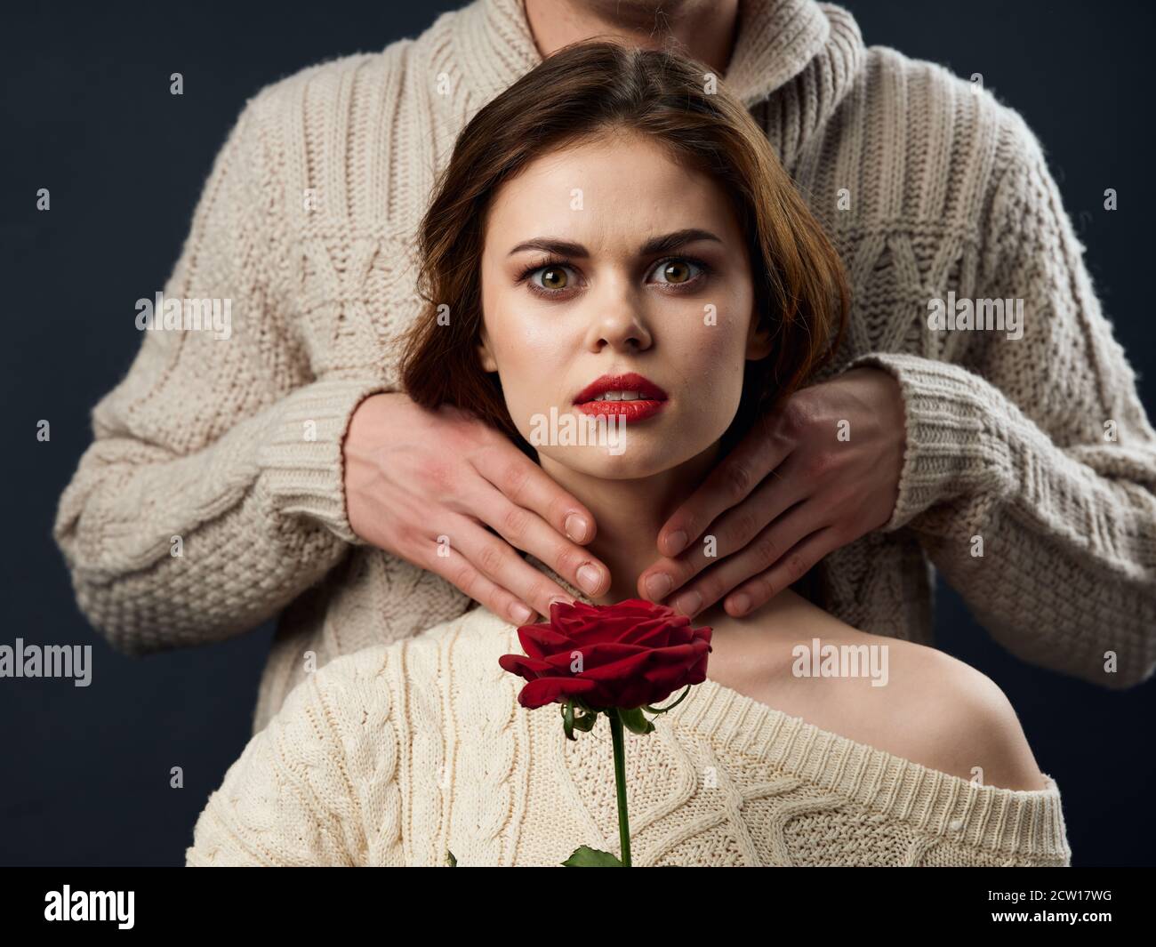 Man holds a woman by the neck Rose romance family luxury Stock Photo ...