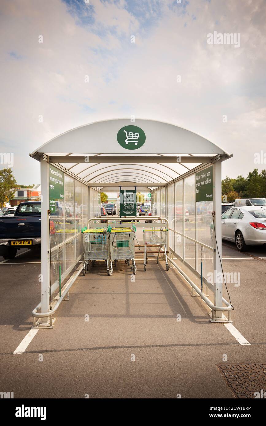 Almost empty Morrisons supermarket shopping trolley bay in car park on ...