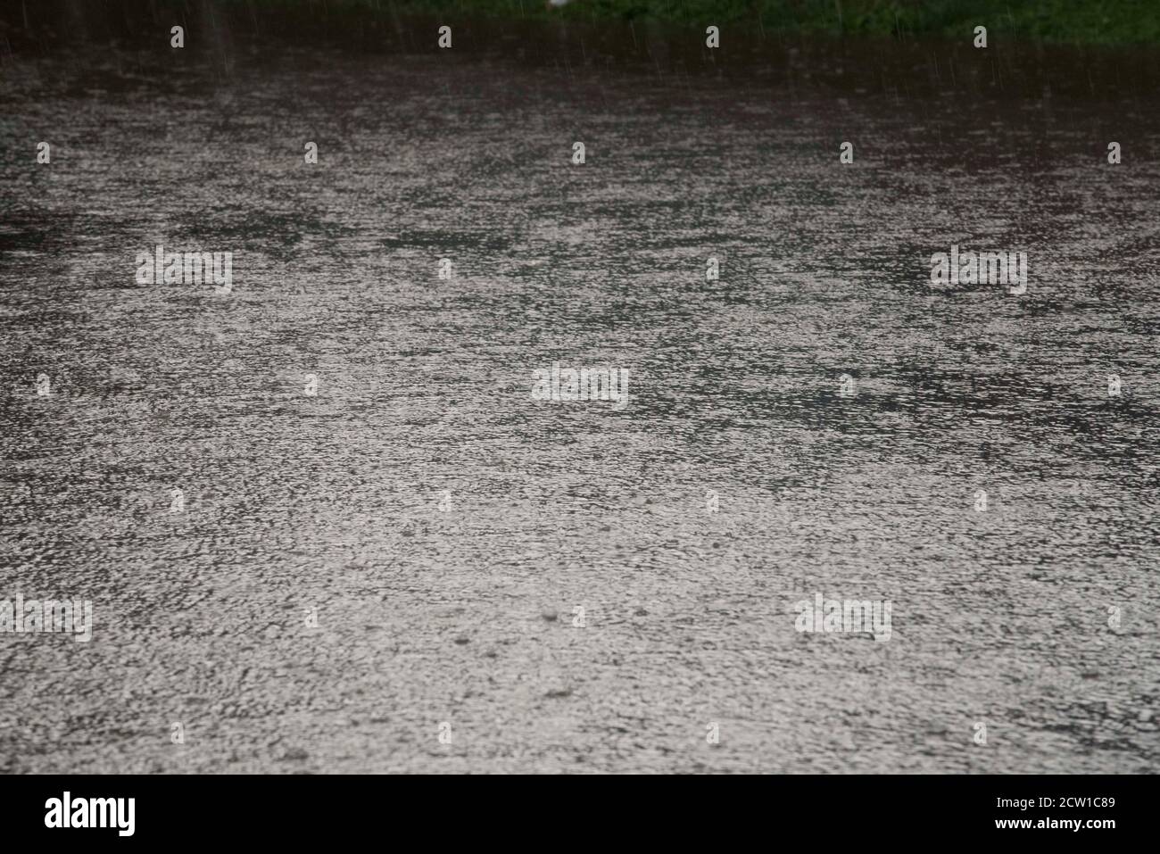 rain puddles on the ground, heavy rainfall in the rainy season Stock ...