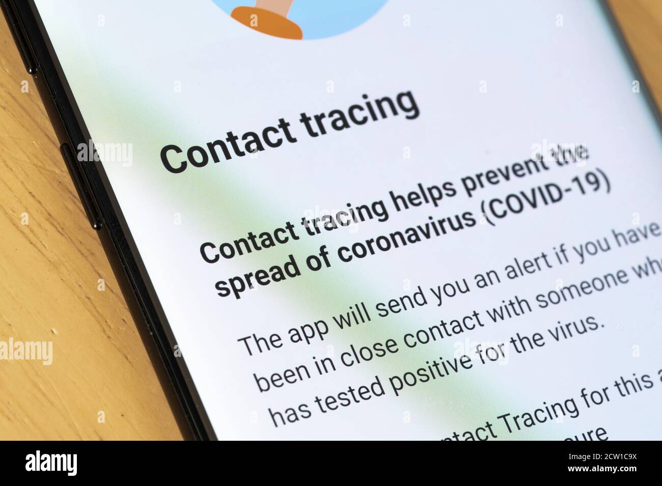 A smartphone screen displaying the NHS Test and Trace app for contact ...