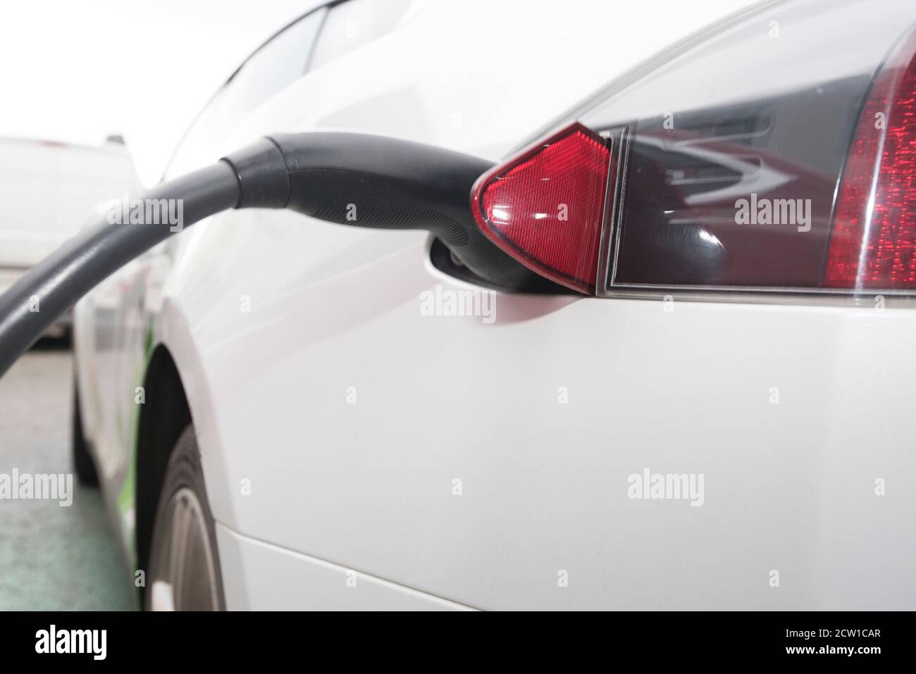 charging of an electric car at an electric filling station Stock Photo ...