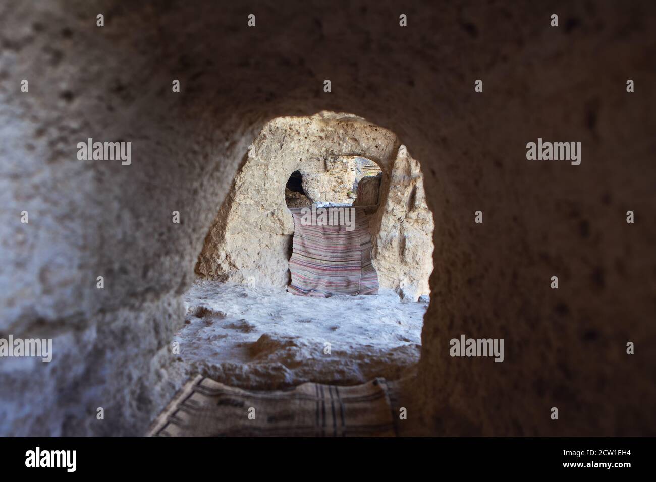 Ancient prayer room in the caves of old monastery Stock Photo - Alamy