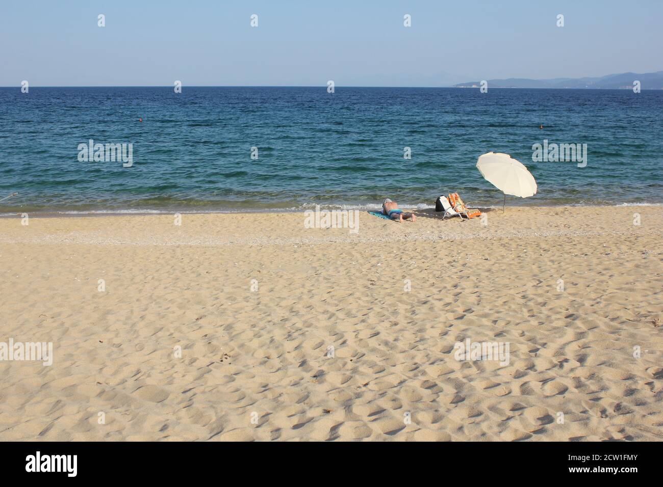 A man on Mikro beach in Mount Pelio , Greece Stock Photo - Alamy