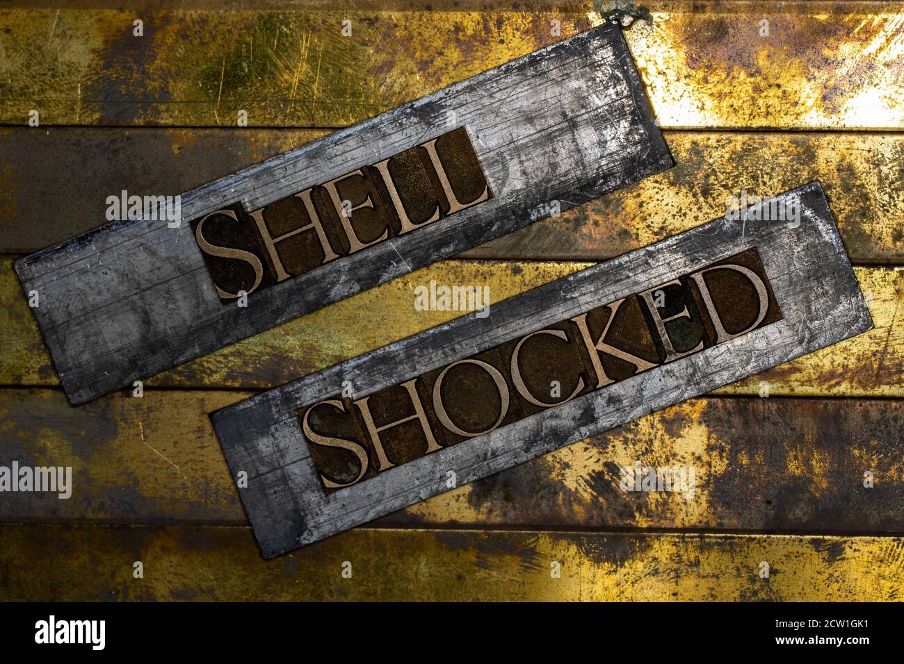 Shell Shocked text message on textured grunge copper and vintage gold ...