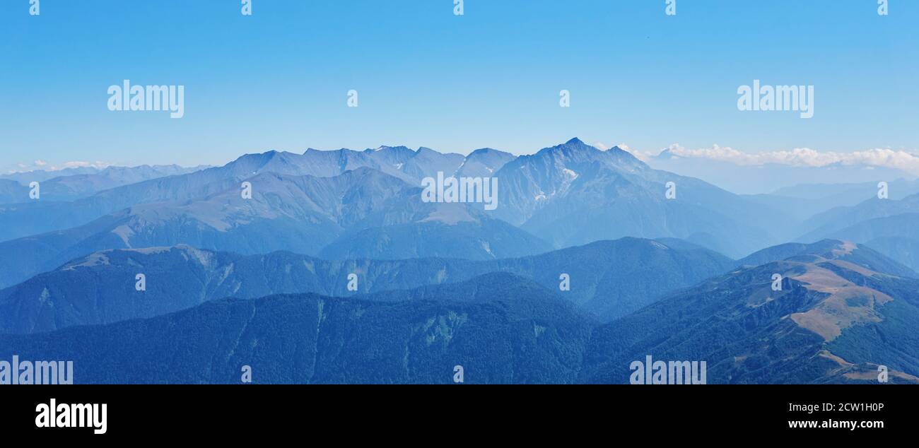view of high mountain ranges to the horizon from one of the peaks Stock ...