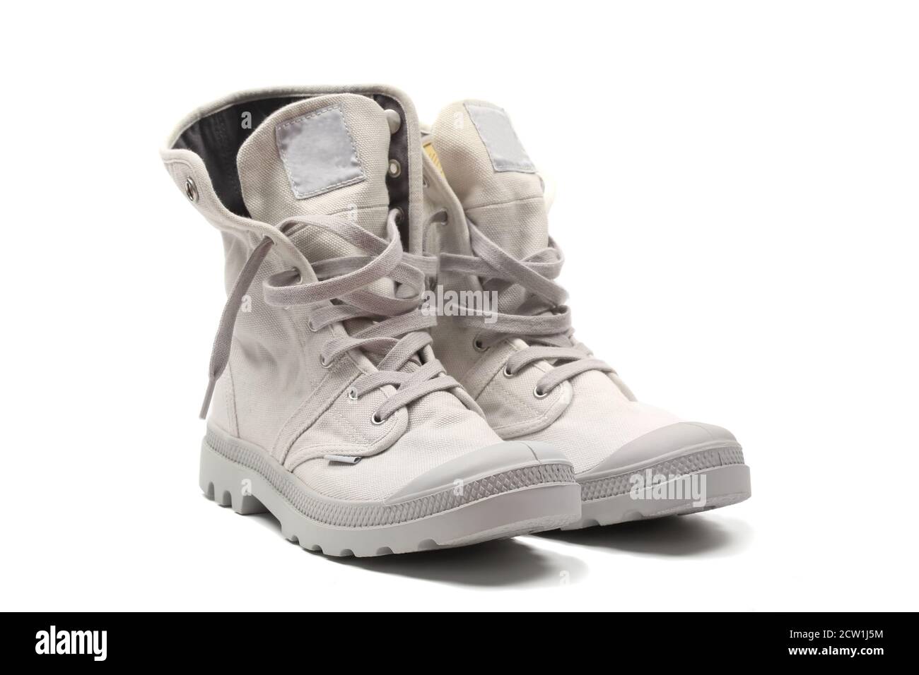 Canvas boots, isolated over white background Stock Photo - Alamy