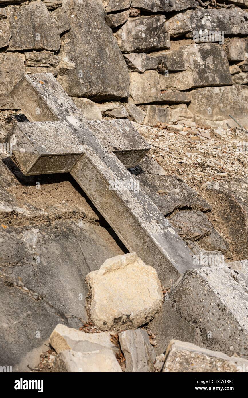 Old broken crucifix at grave hi-res stock photography and images - Alamy
