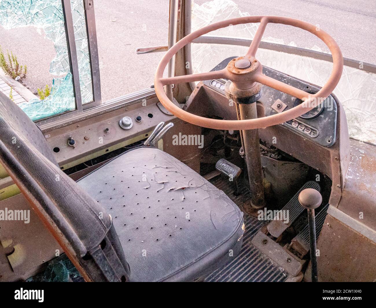 Steering wheel of an abandoned retro bus Stock Photo - Alamy