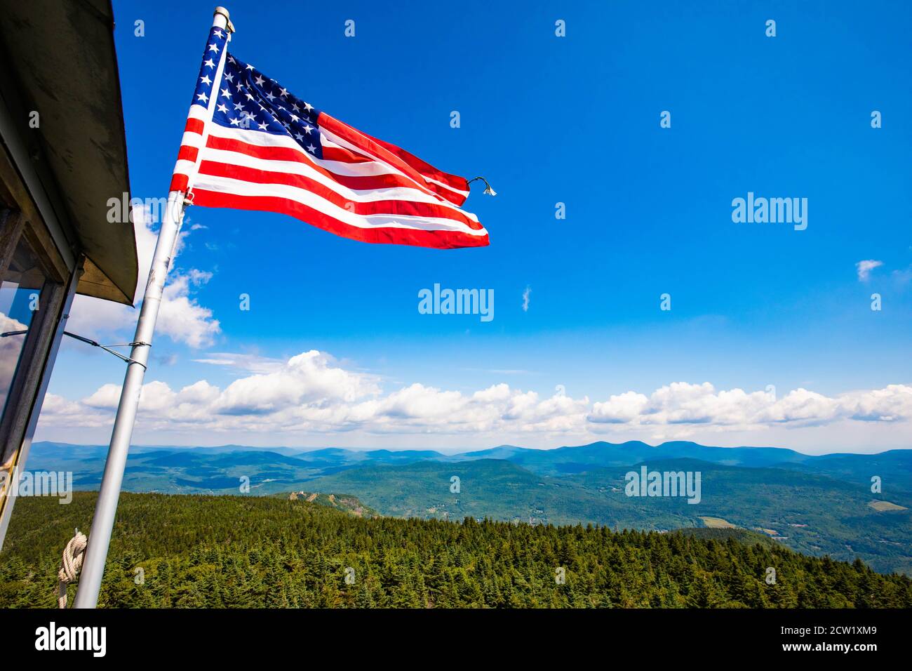USA flag on top of the National Park mountain symbol of freedom summer ...