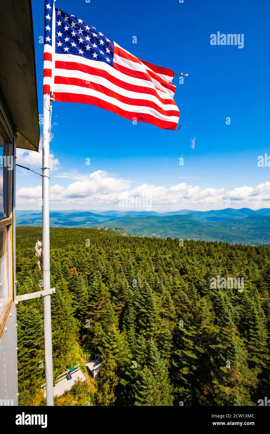 USA flag on top of the National Park mountain symbol of freedom summer ...