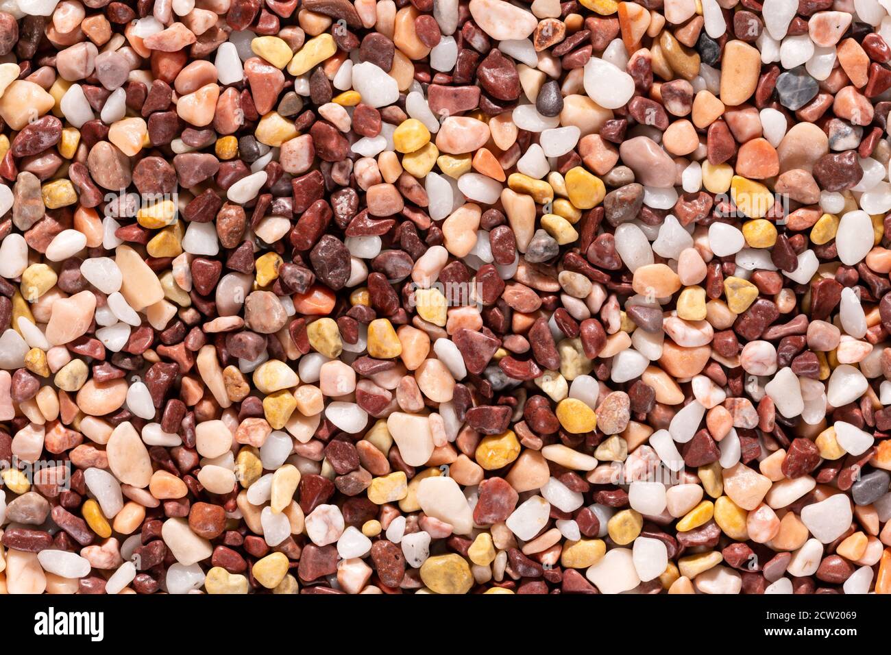Multi-colored small river stones texture and background Stock Photo - Alamy