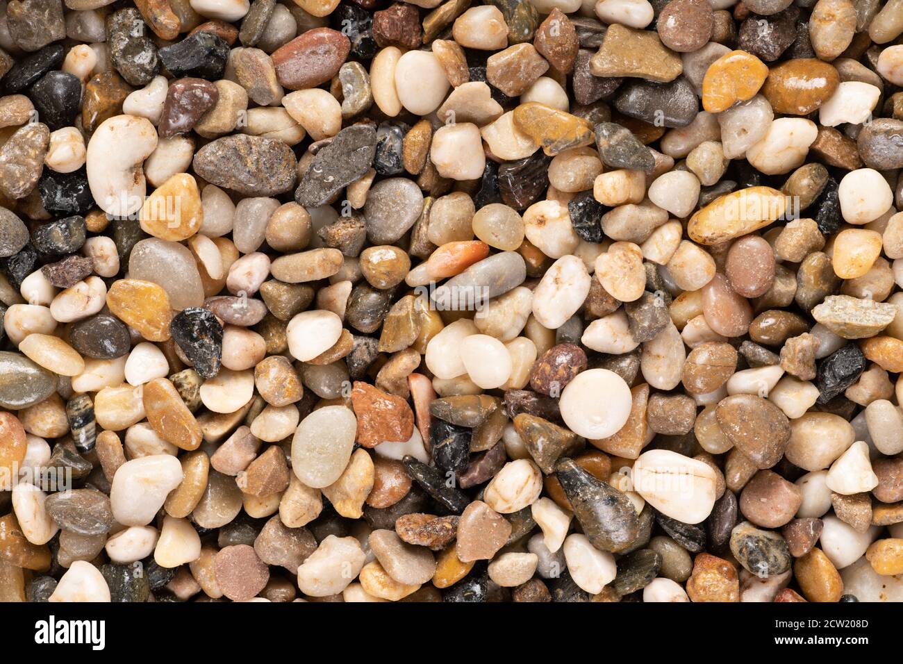 Damp Alaskan multi-colored small river stones texture and background ...