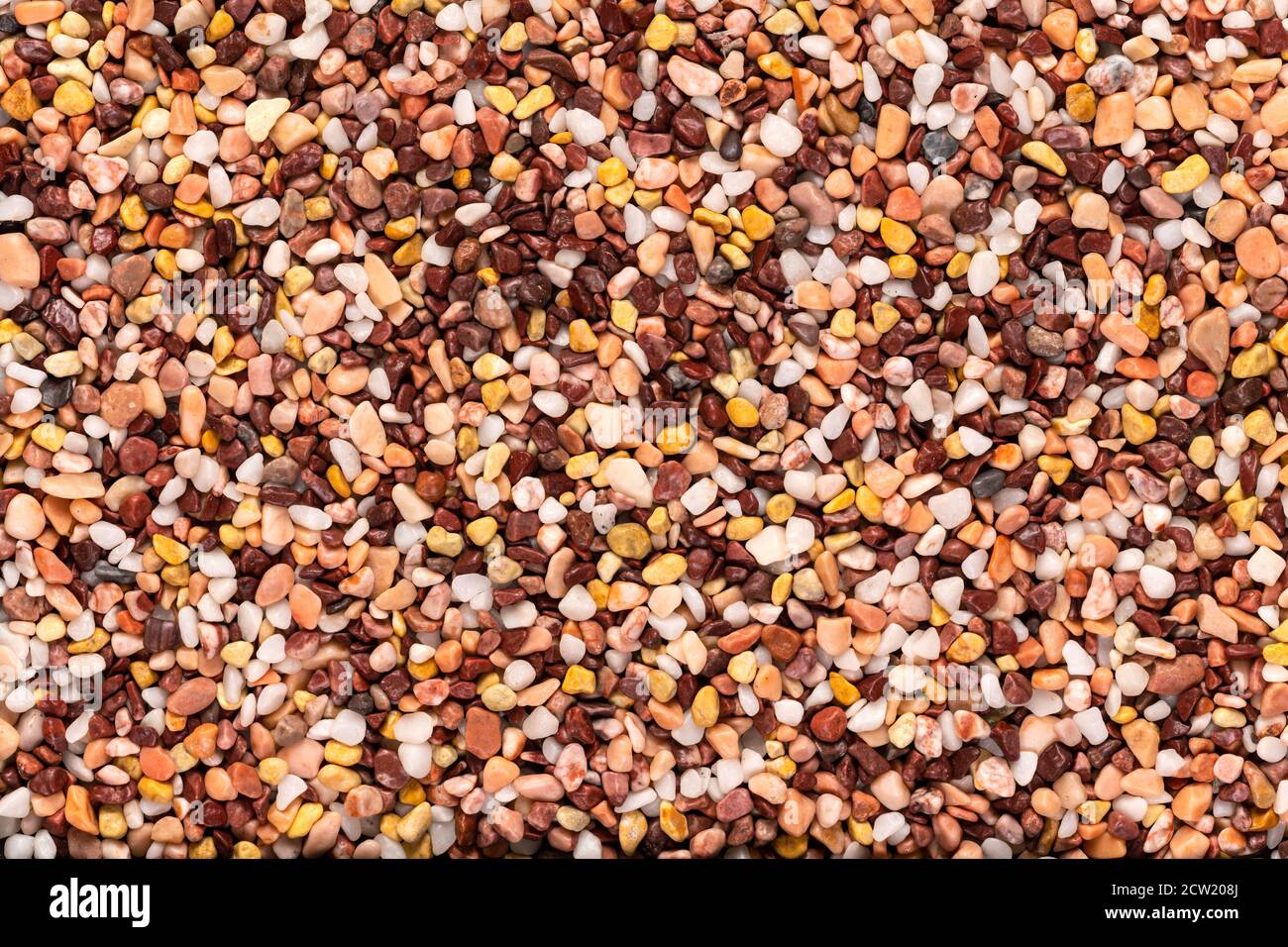 Multi-colored small river stones texture and background Stock Photo - Alamy