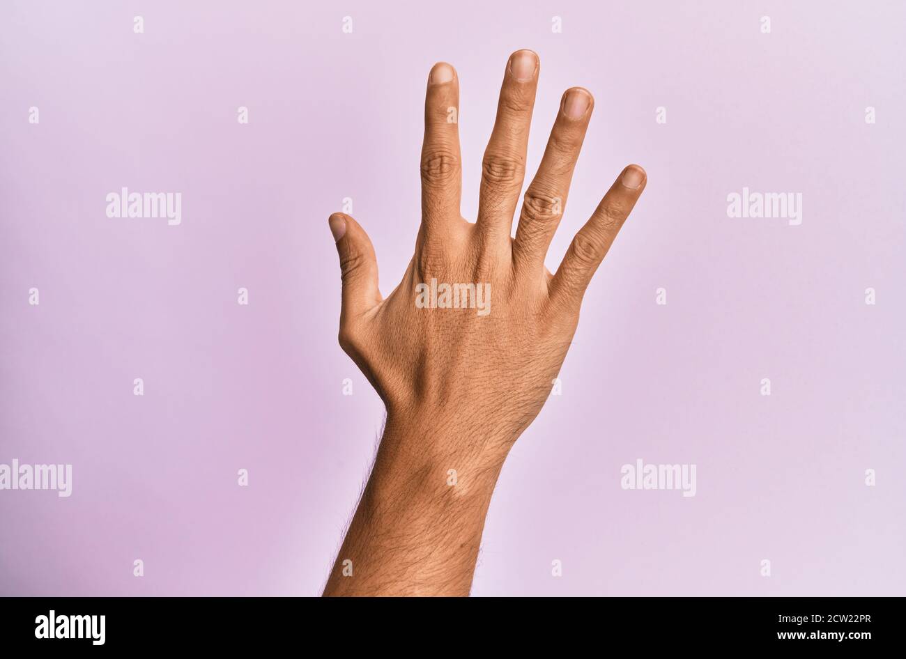 Hand back showing five fingers hi-res stock photography and images - Alamy