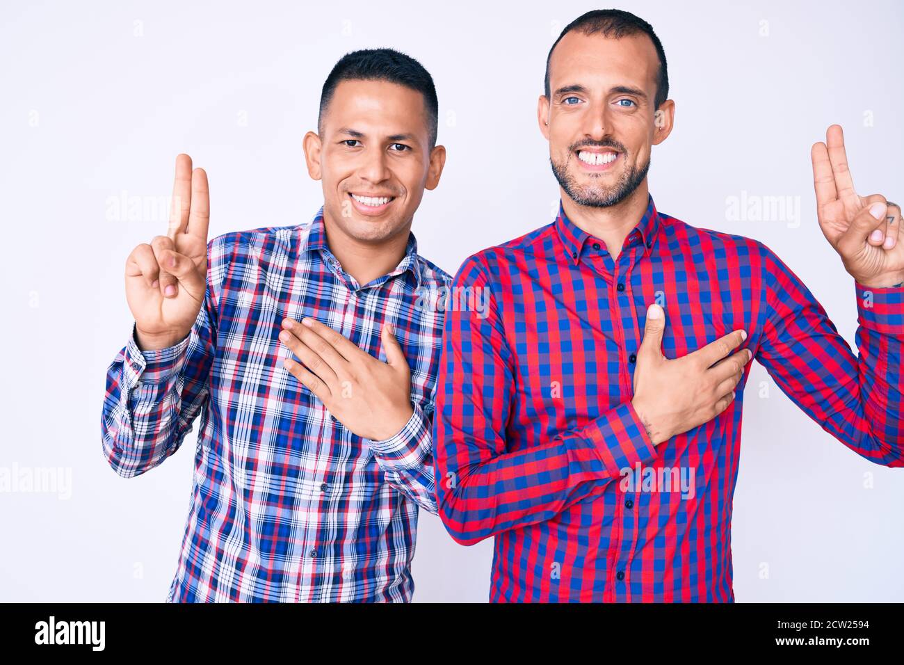 Two fingers swearing hi-res stock photography and images - Alamy