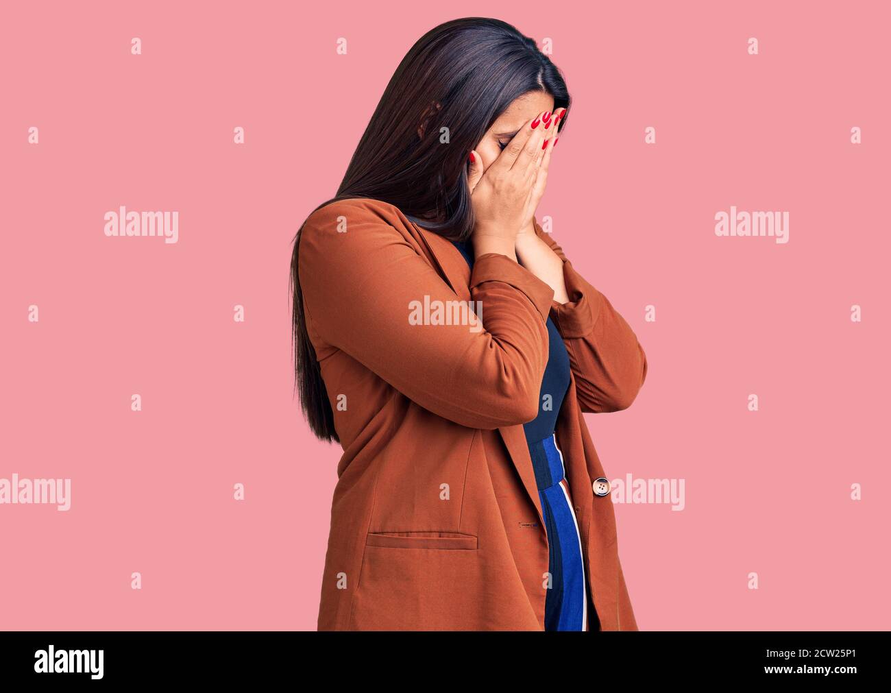 Young beautiful brunette woman wearing elegant clothes with sad ...