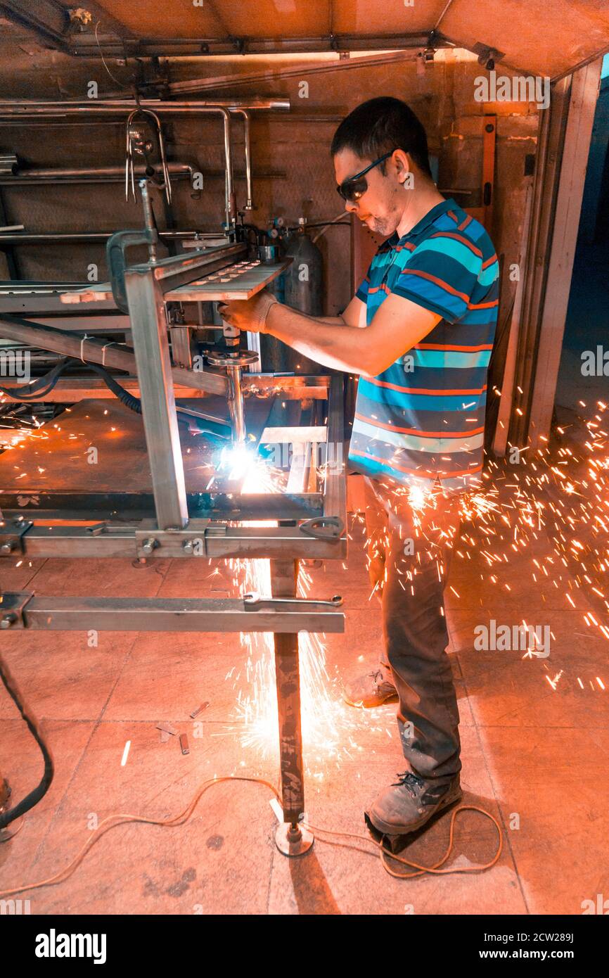 Plasma sheet metal cutting operator on a rack Stock Photo - Alamy