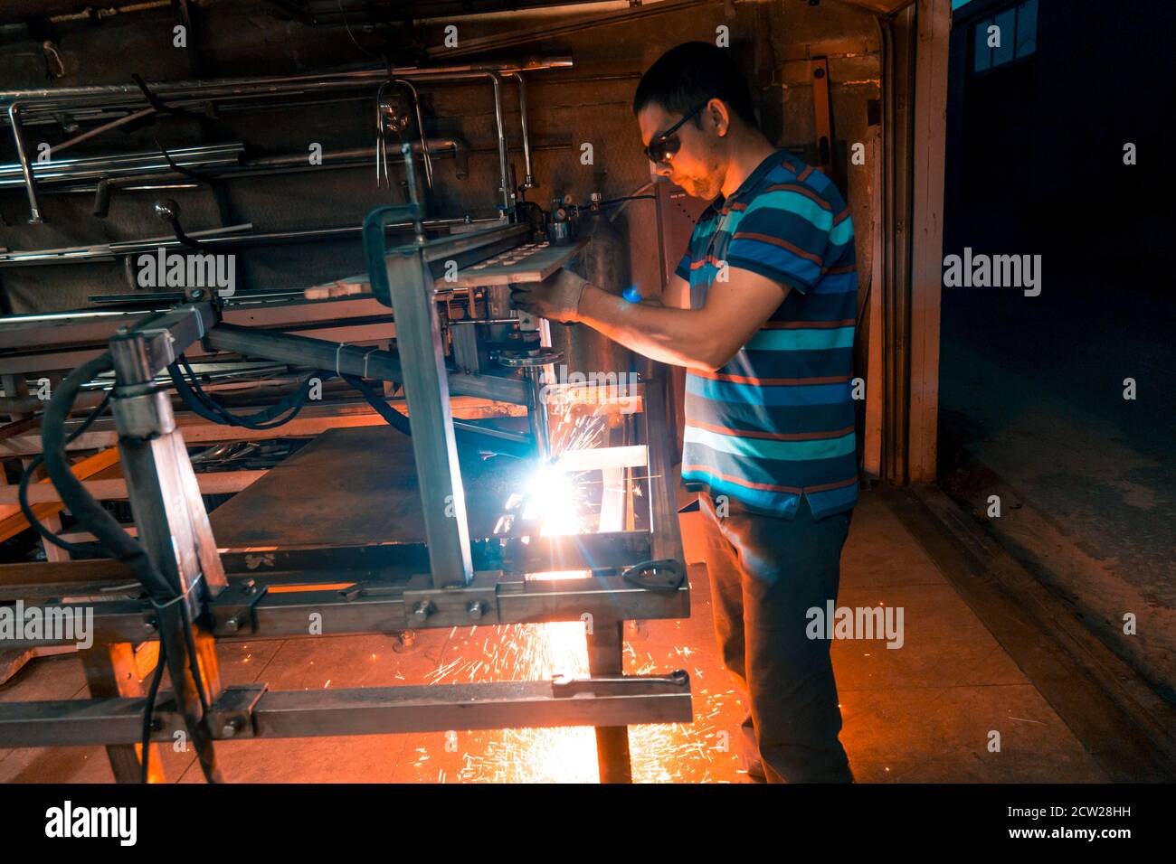 Plasma sheet metal cutting operator on a rack Stock Photo - Alamy