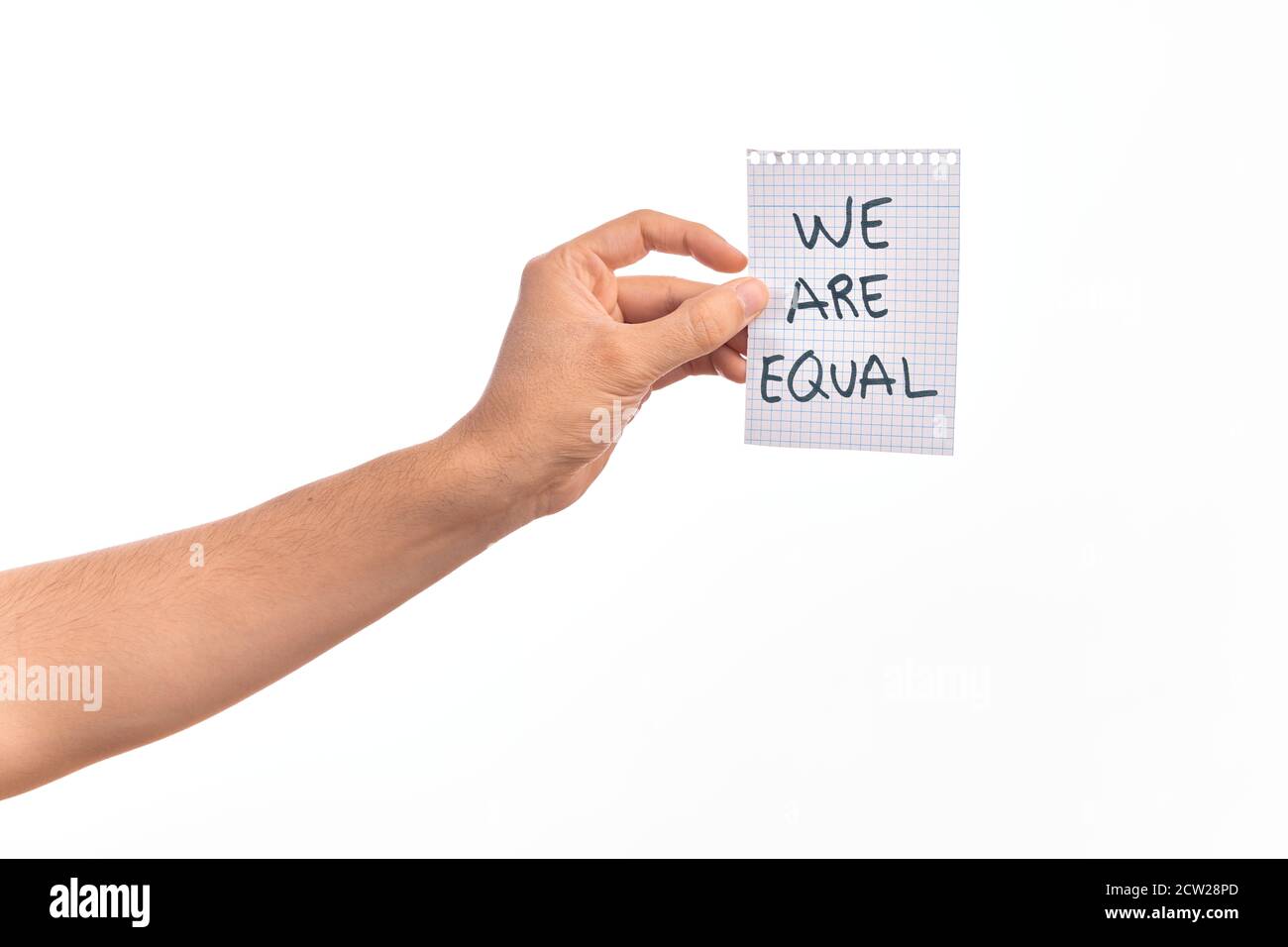 Cardboard banner WE ARE EQUAL, protesting for equal rights over ...