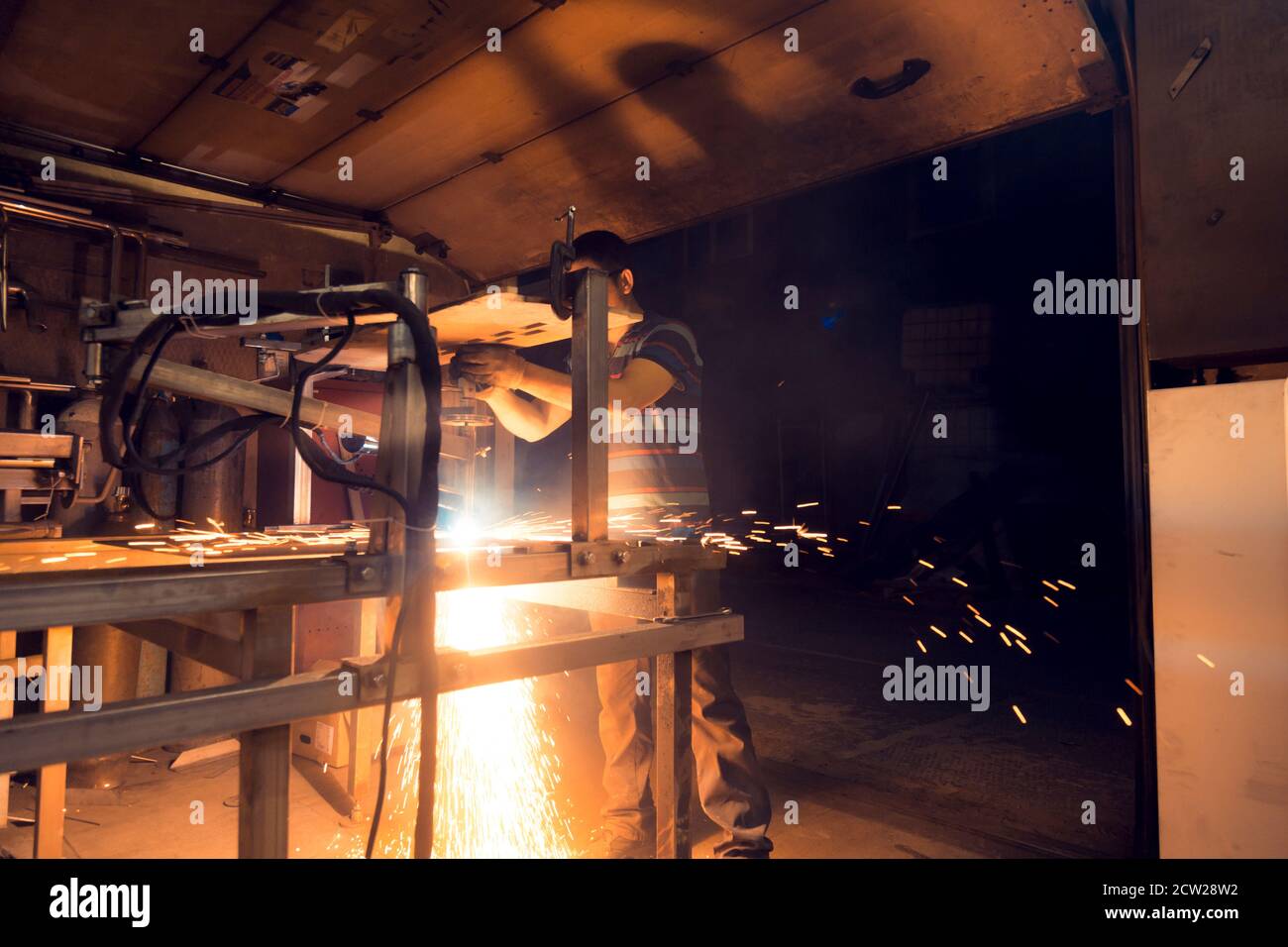 Plasma sheet metal cutting operator on a rack Stock Photo - Alamy