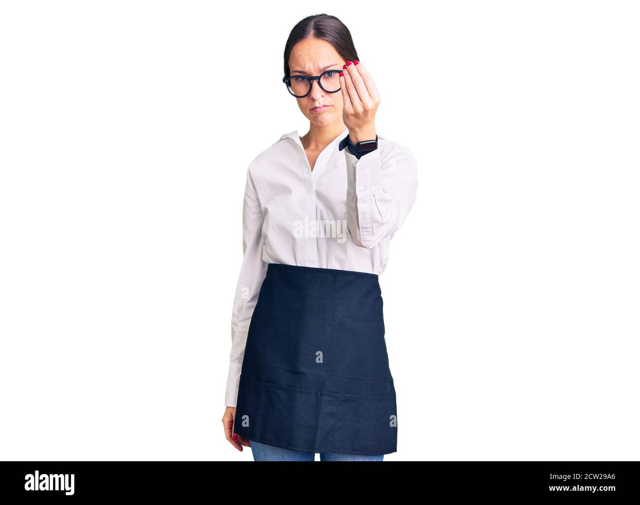 Beautiful brunette young woman wearing professional waitress apron ...