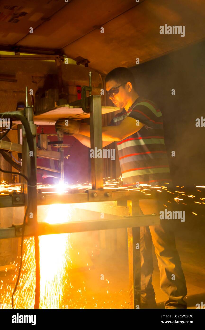 Plasma sheet metal cutting operator on a rack Stock Photo - Alamy