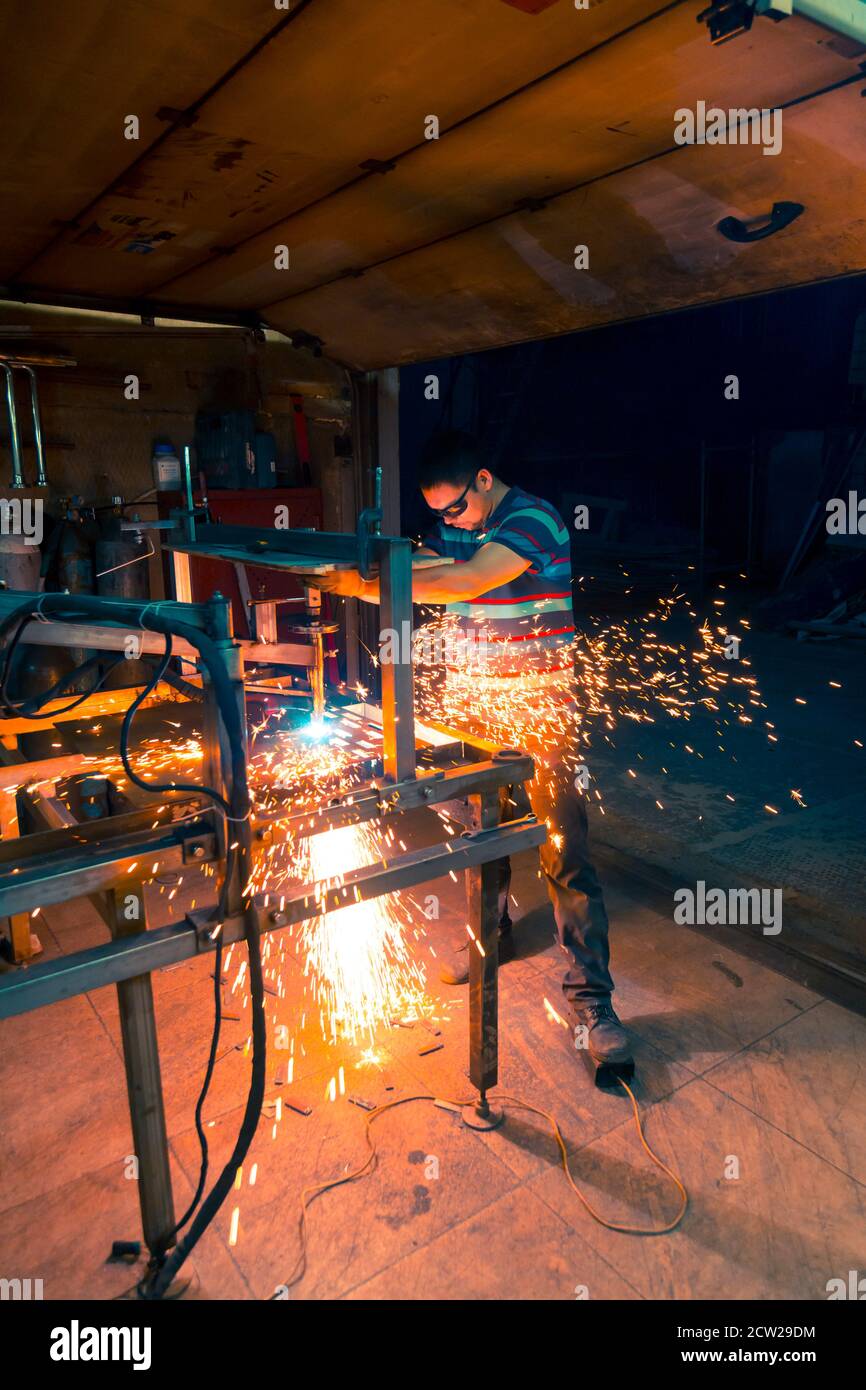 Plasma sheet metal cutting operator on a rack Stock Photo - Alamy