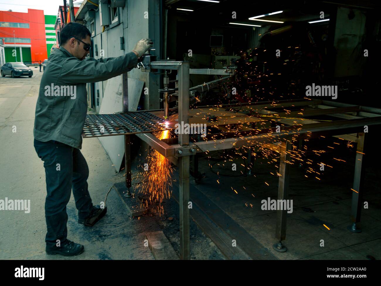 Plasma sheet metal cutting operator on a rack Stock Photo - Alamy