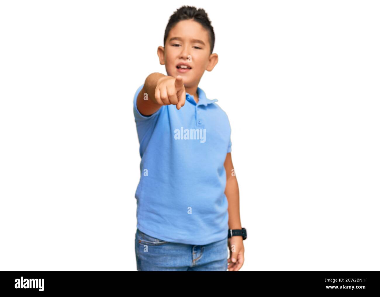 Little boy hispanic kid wearing casual clothes pointing displeased and ...