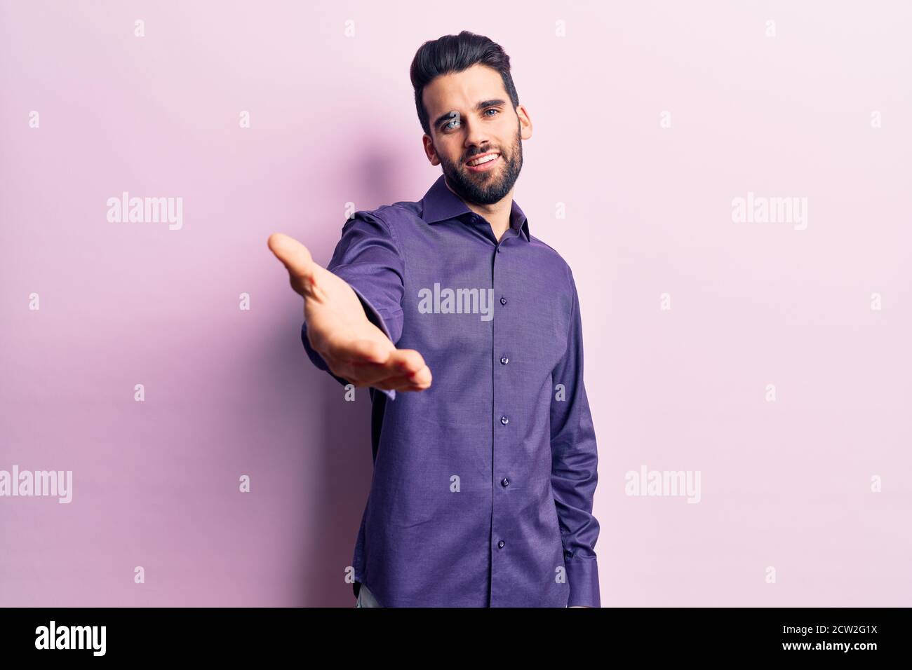 Young handsome man with beard wearing casual shirt smiling cheerful ...