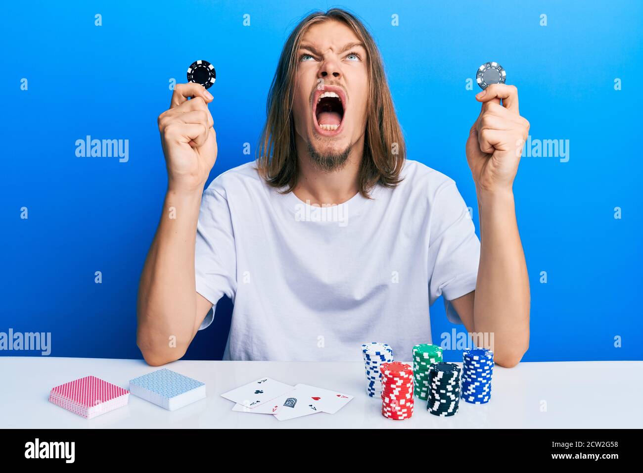 Man playing with his hair stress hi-res stock photography and images ...
