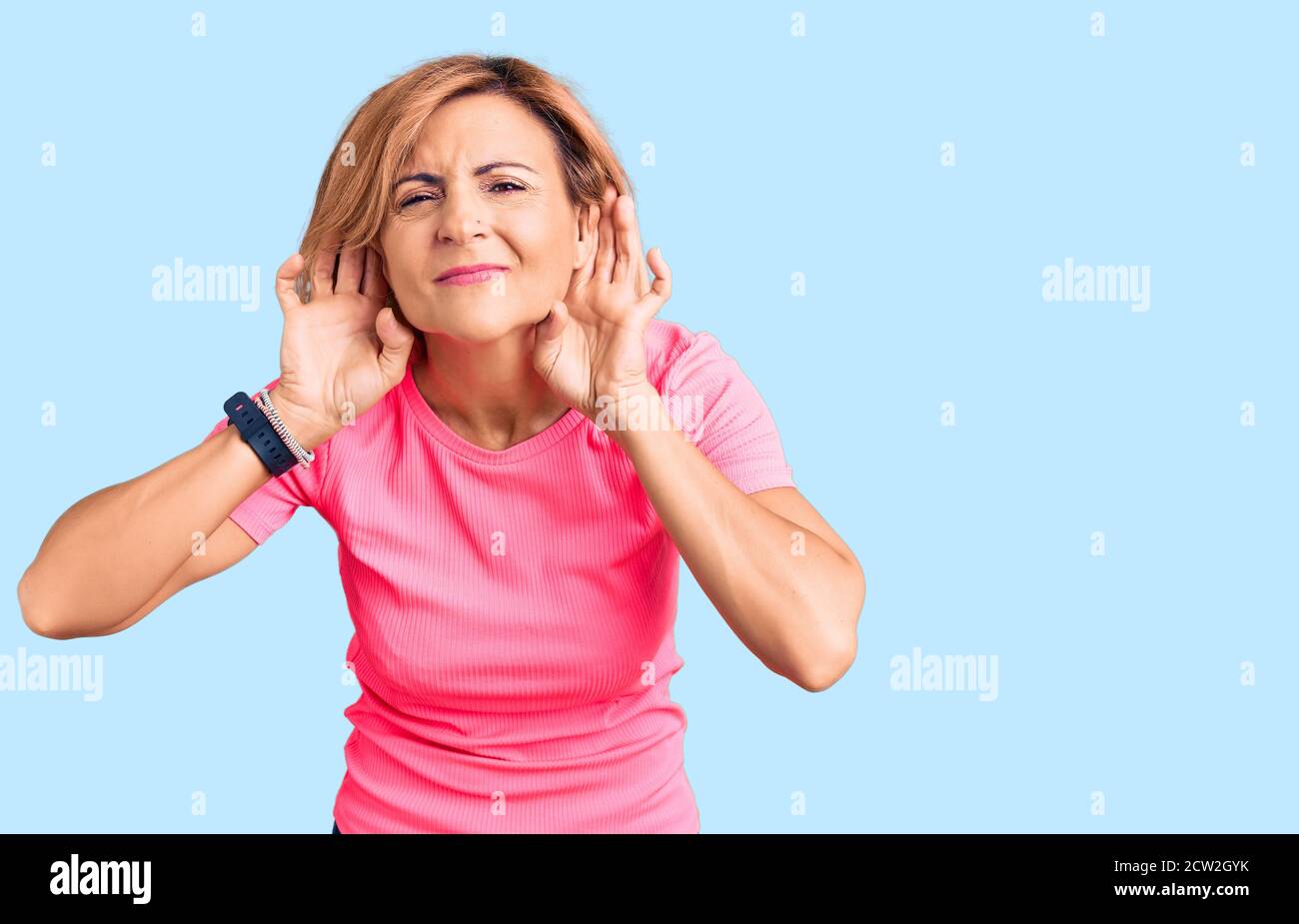 Attractive blonde woman trying hear hi-res stock photography and images ...