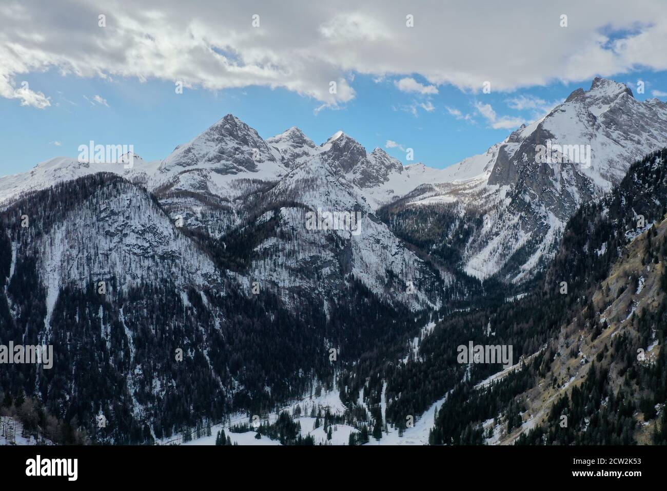 aerial snow covered mountain peaks in alps at winter Stock Photo - Alamy