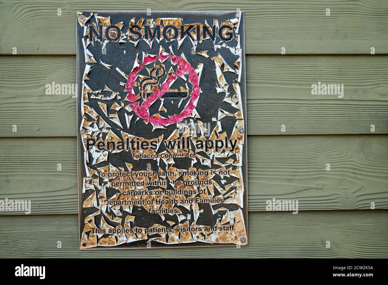 Old weathered and sun damaged No Smoking sign Stock Photo - Alamy