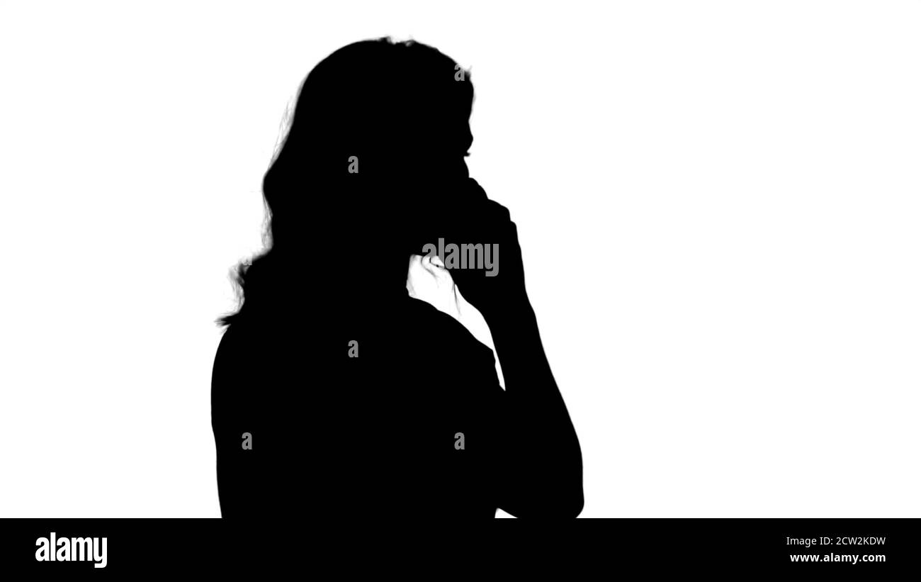 Silhouette Woman talking on the phone Stock Photo - Alamy