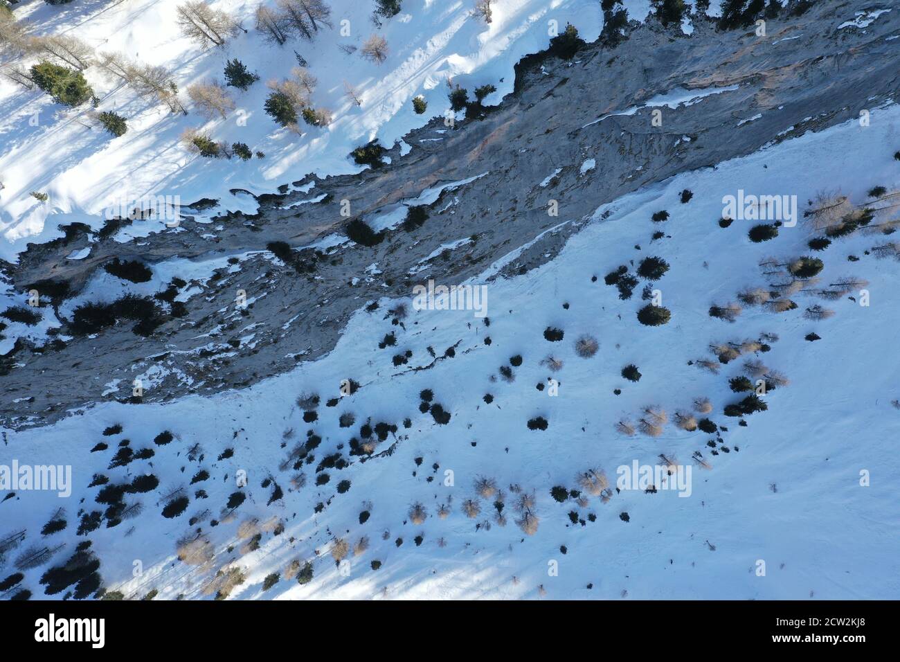 aerial snow covered mountain peaks in alps at winter Stock Photo - Alamy