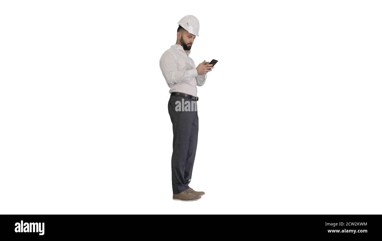 Smart engineer in white shirt and safety engineering hat using s Stock ...